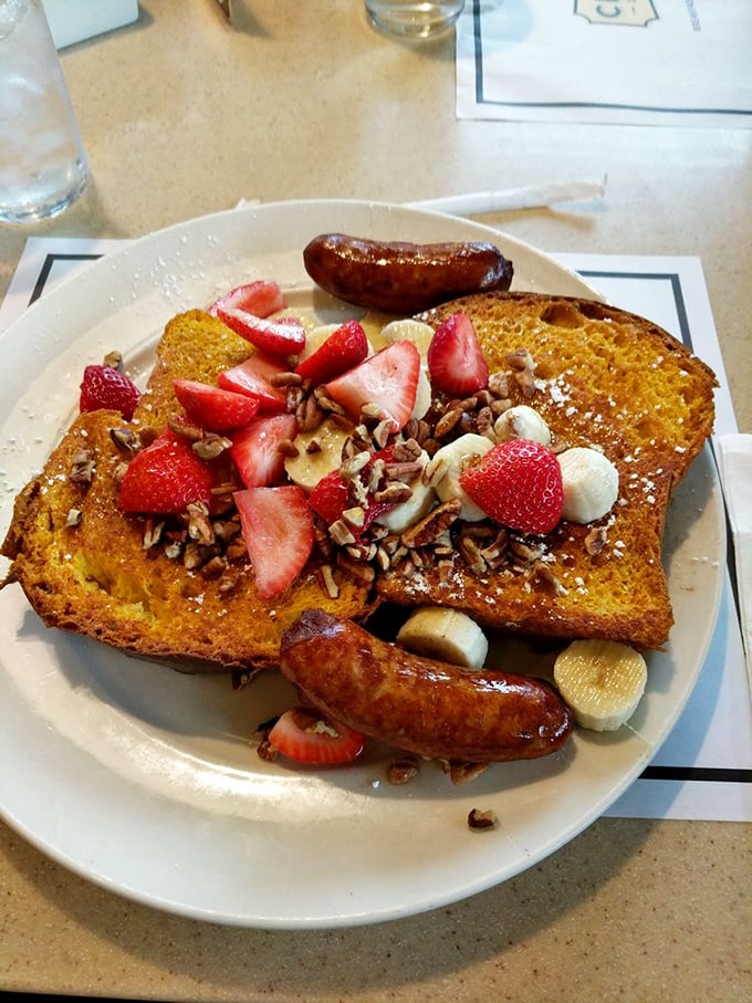 French toast that's dressed for success with strawberries, bananas, and pecans. Breakfast or dessert? The line blurs deliciously here.