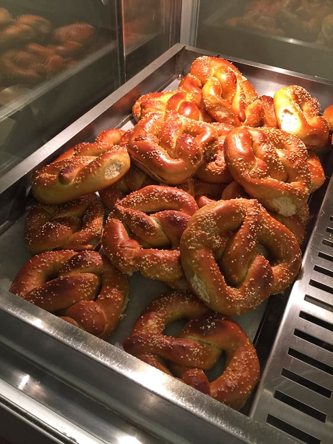 A tray of freshly baked pretzels showcasing that perfect mahogany color that says "I'm ready for my close-up—and your taste buds."