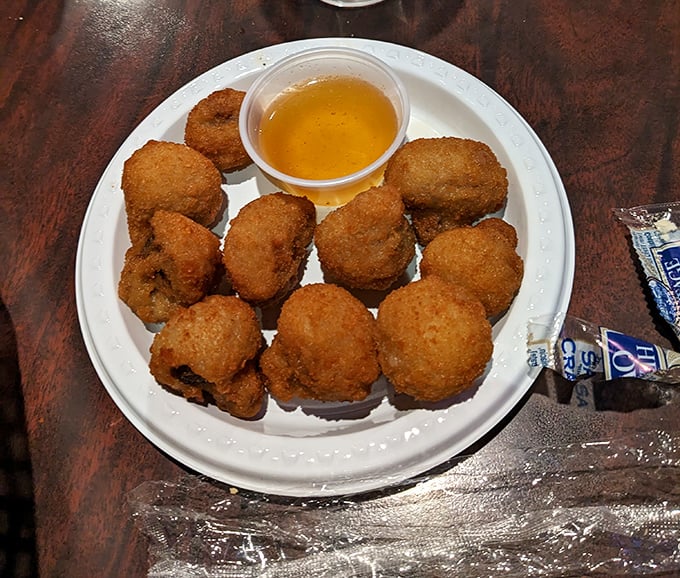 Button mushrooms living their best fried life, like little golden nuggets from a delicious treasure chest.