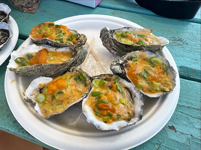 These grilled oysters wear their toppings like couture—dressed to impress but still letting their natural beauty shine through.