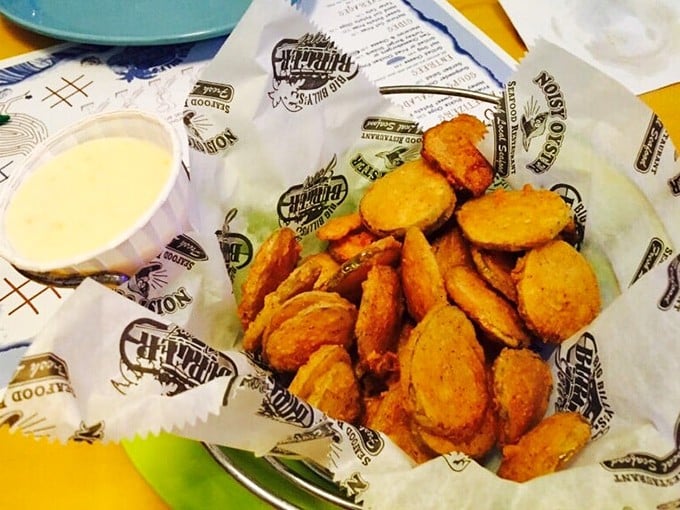 Golden-fried pickle chips – the South's greatest contribution to appetizer culture since someone first thought to fry an okra.