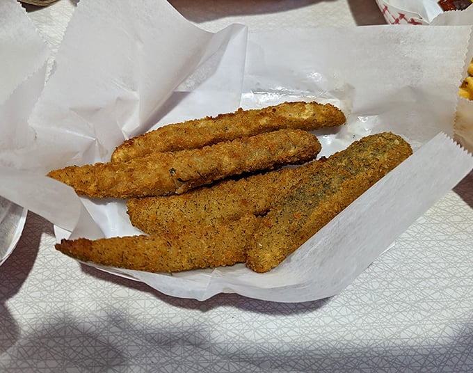 Golden-fried pickle spears – the unexpected sidekick that steals scenes with its perfect balance of crispy exterior and tangy interior.