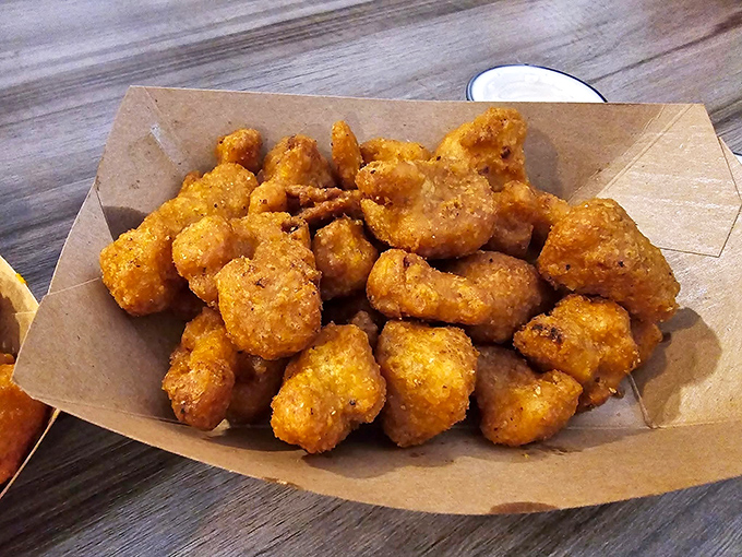 Fried cauliflower that could convert vegetable skeptics into true believers. Crispy outside, tender inside—the vegetable equivalent of winning the lottery.