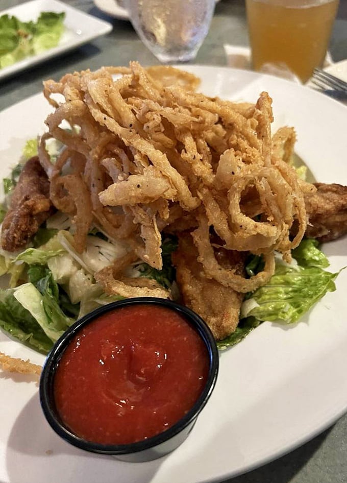 Crispy, golden-fried oysters that crunch like autumn leaves—if autumn leaves tasted like heaven and came with cocktail sauce.