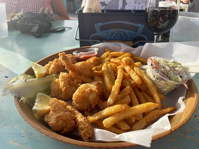 A fried shrimp basket that delivers golden perfection with every crispy, succulent bite you take.
