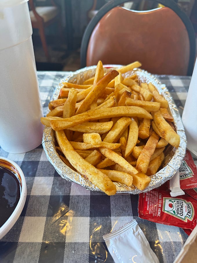 French fries that understand their supporting role but still show up ready to perform alongside the barbecue stars.