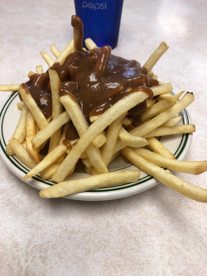 Gravy fries: where potatoes go to fulfill their highest purpose. That sauce isn't just a topping—it's a transformative experience.