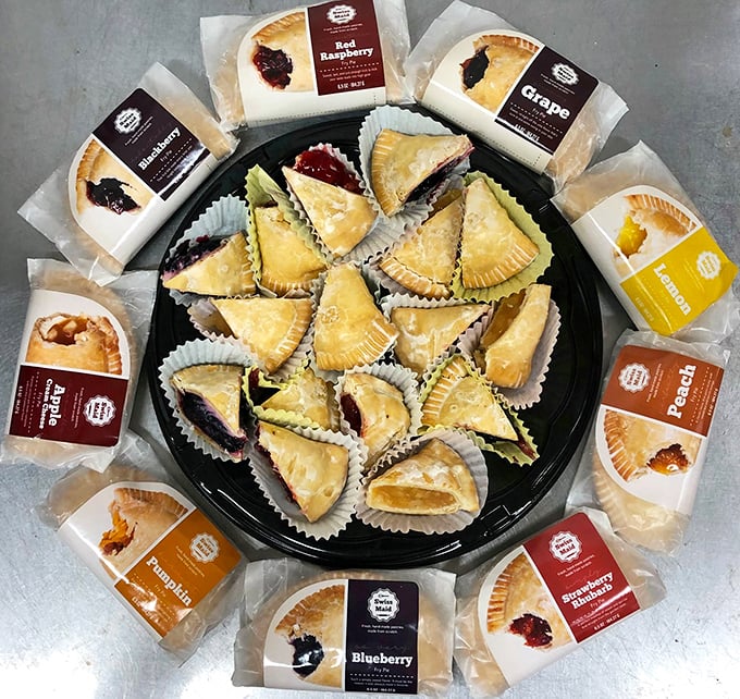 These hand pies are like edible treasure chests – golden, flaky exteriors guarding fruit fillings so good you'll contemplate ordering one in every flavor.