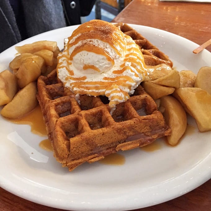 This isn't just a waffle—it's a throne for that perfect scoop of ice cream, drizzled with caramel like a royal robe. Breakfast or dessert? Yes.