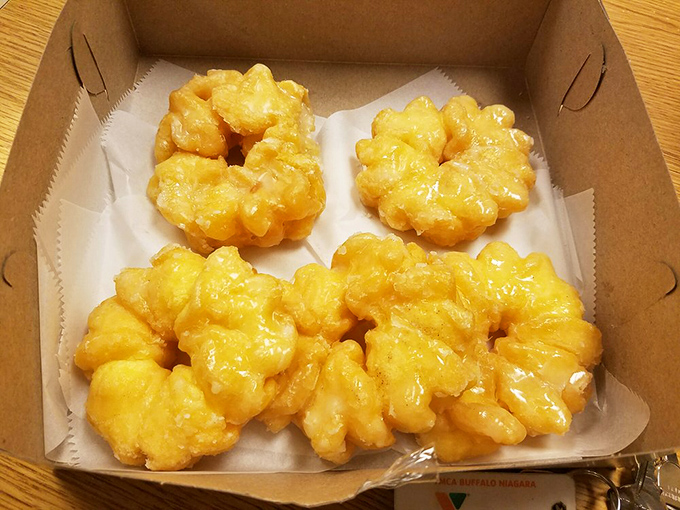 Golden cruller flowers that glisten with glaze—proof that sometimes the most beautiful things in life are deep-fried and sweet.