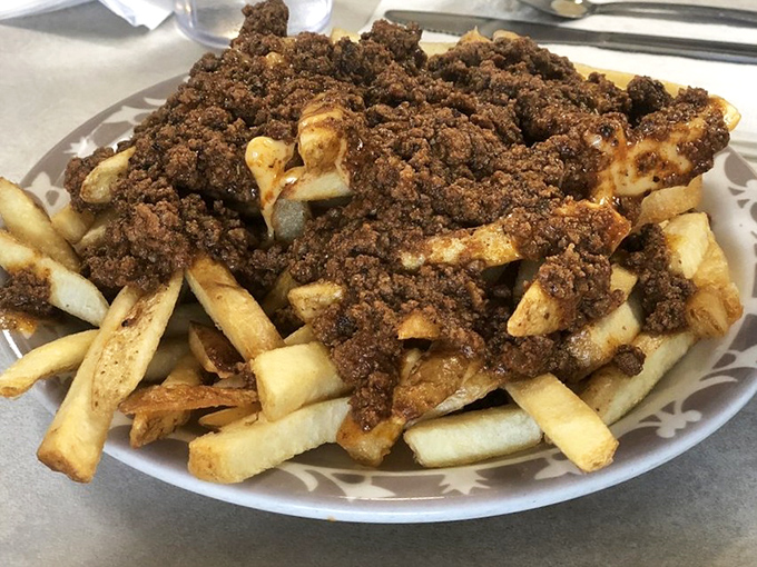 Greek fries: where seasoned ground beef meets crispy potatoes in a relationship your cardiologist warned you about.