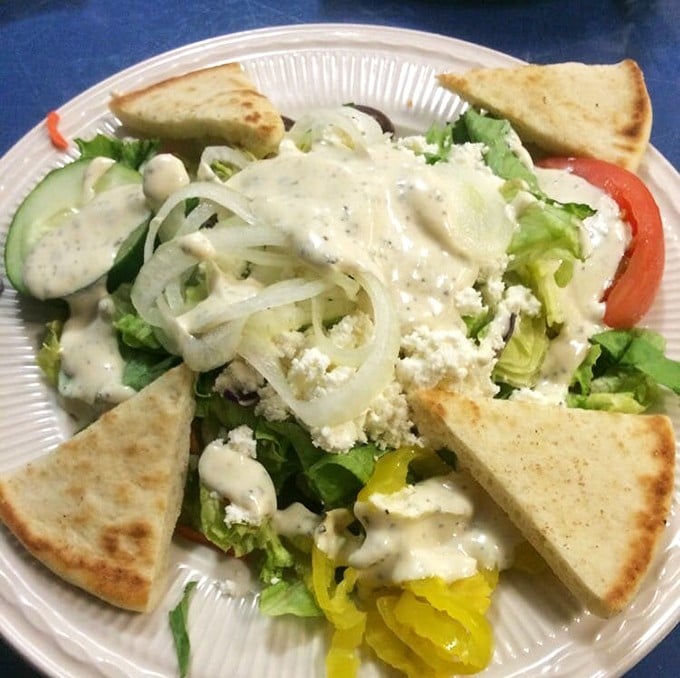 A proper Greek salad isn't just a side dish – it's a celebration of simplicity where feta, olives, and vegetables perform a perfectly choreographed flavor dance.