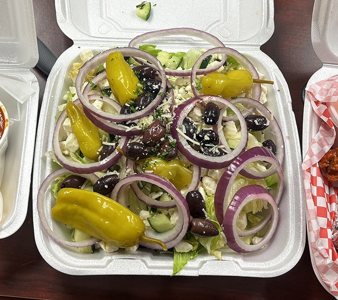 A Greek salad that brings Mediterranean sunshine to Ohio. Those purple onion rings aren't just ingredients—they're flavor hoops to jump through with joy.