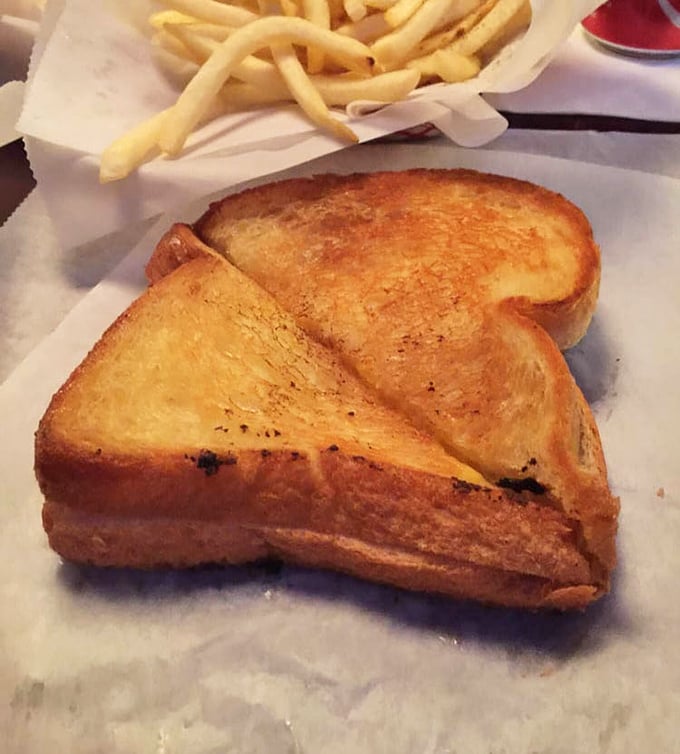The grilled cheese that launched a thousand childhood memories, elevated to its perfect adult form with golden-brown edges and melty insides.
