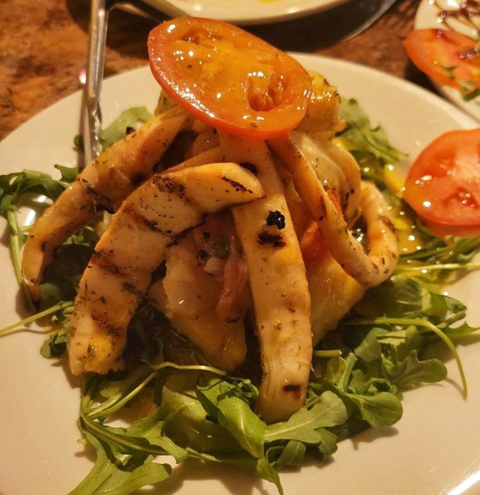 Tender octopus meets peppery arugula in a Mediterranean dance that'll make your taste buds tango.