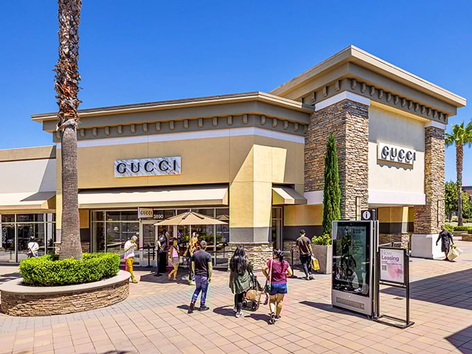 The Gucci storefront beckons like a siren song to label-lovers. Those palm trees aren't just decoration—they're there to fan you when you faint at the discounts.