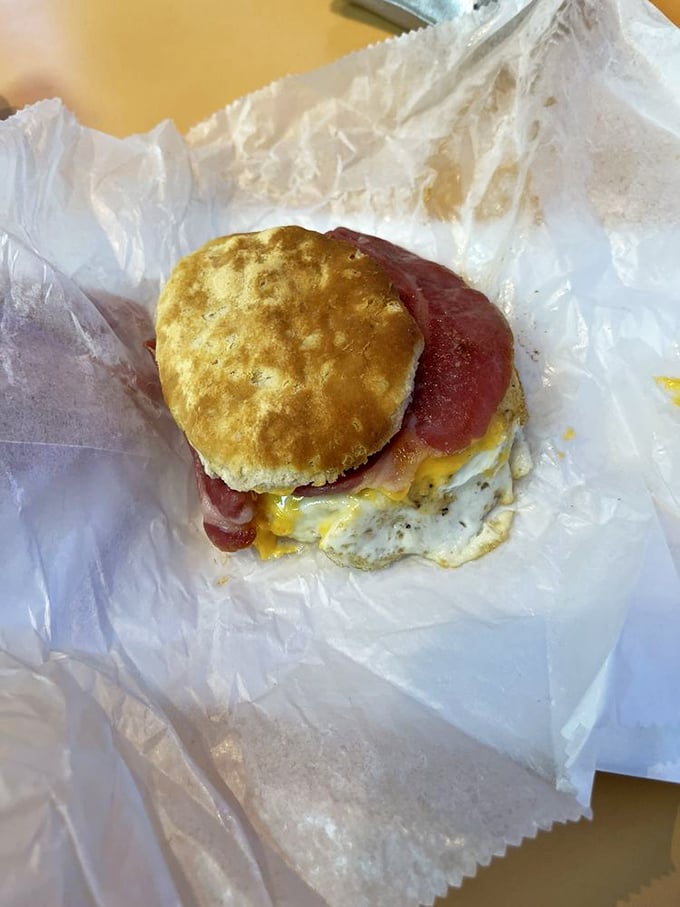 Breakfast perfection on a biscuit. That golden dome of pastry cradling egg and ham is the morning hero we all deserve.
