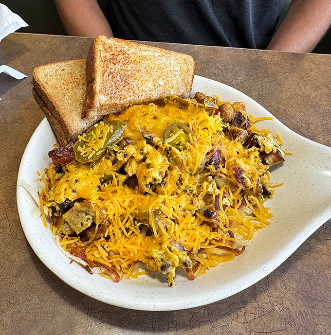 Hash brown scramble loaded with cheese transforms humble potatoes into a masterpiece worth celebrating loudly.
