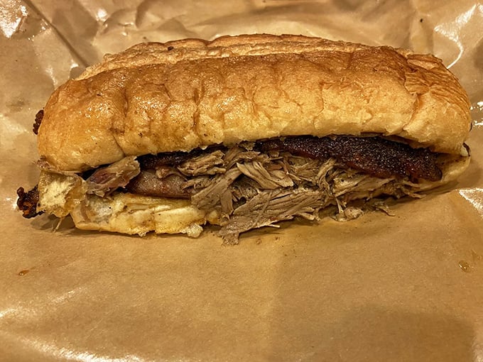 The sandwich that launched a thousand napkins. This pulled pork creation doesn't care about your shirt – it's on a mission to your taste buds.