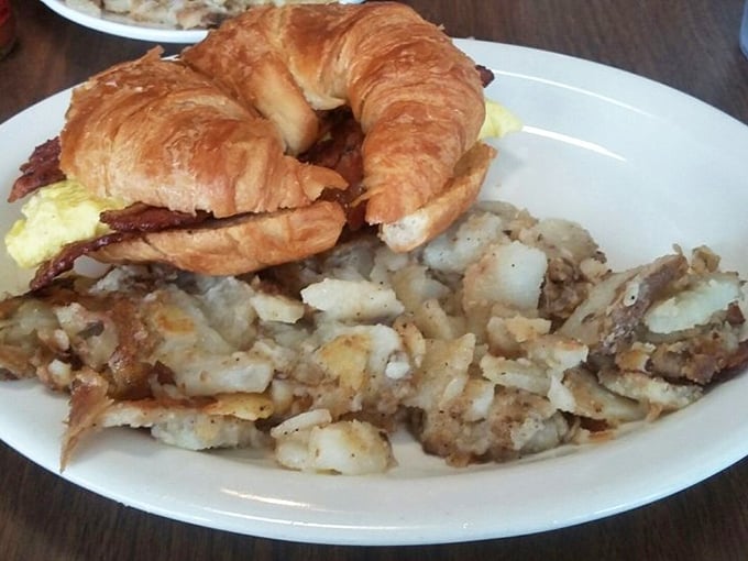 The breakfast sandwich and home fries combo—proof that sometimes the simplest pleasures deliver the most satisfaction.