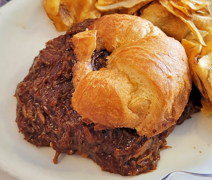 Hot beef sandwich – the unsung hero of diner cuisine. Tender meat nestled on a pillowy bun, ready to transport you to simpler times.