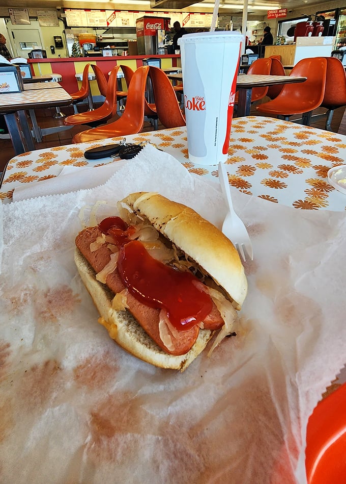 Hot dogs dressed the way America intended—simple, satisfying, and served on paper that captures every delicious drip of nostalgia.