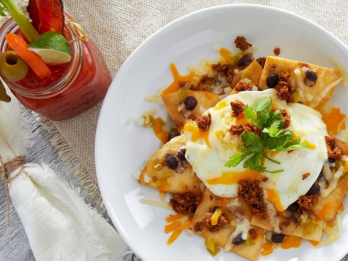 Not your grandmother's breakfast nachos—unless your grandmother was a culinary genius with a flair for perfectly runny eggs.