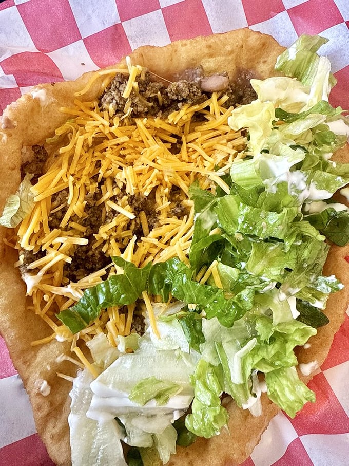 The Indian Taco in all its glory – a mountain of toppings on fry bread that makes regular tacos look like they're not even trying.