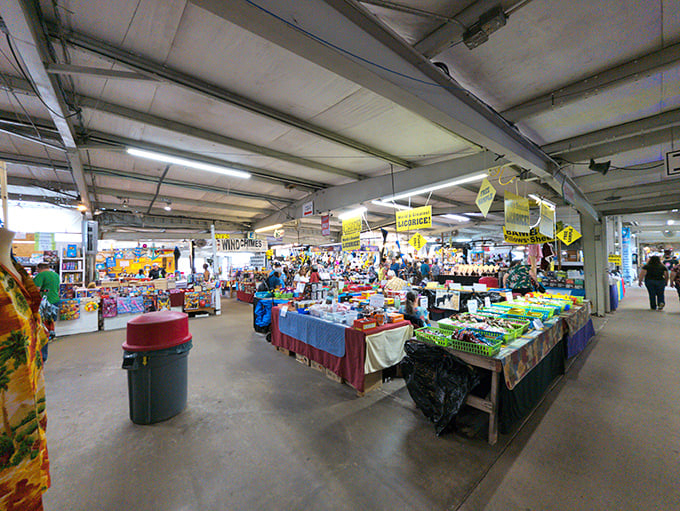 The indoor market's endless aisles offer climate-controlled treasure hunting – like a department store where haggling isn't just allowed, it's expected.