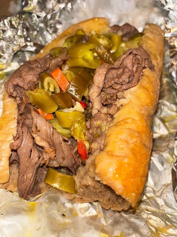 The Italian beef – Chicago's other famous sandwich – arrives wrapped in foil like the precious gift it is, giardiniera adding that essential spicy crunch.
