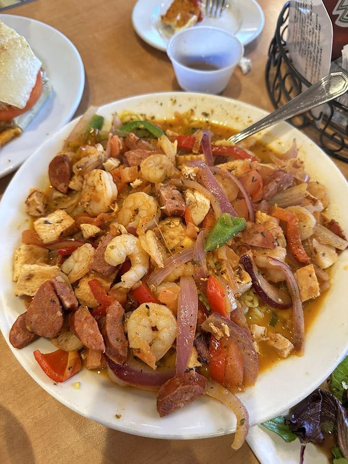 This jambalaya isn't just a dish—it's a spicy celebration where shrimp, sausage, and chicken throw the kind of party your taste buds talk about for days.