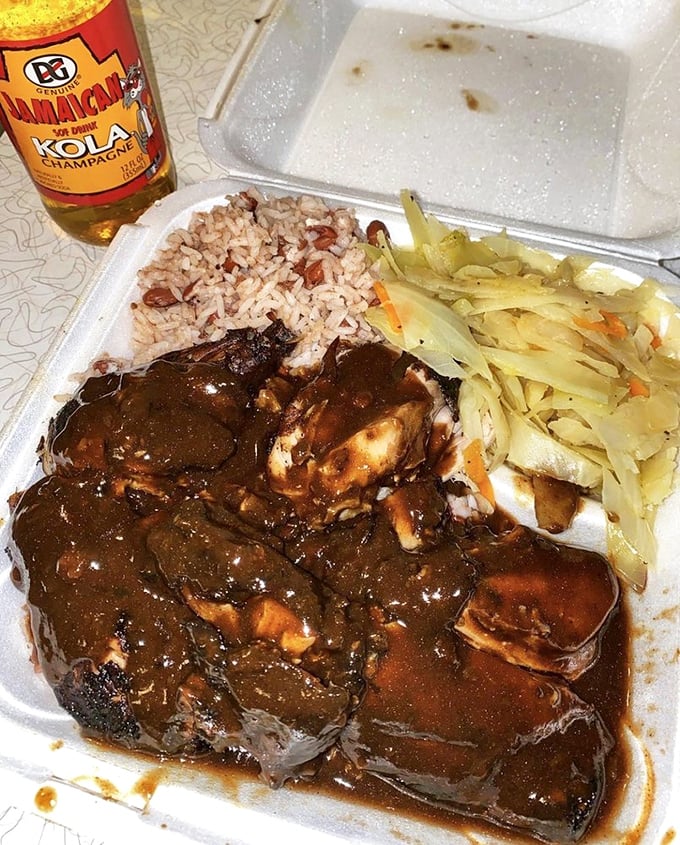 This jerk chicken's deep mahogany color isn't just for show—it's visual evidence of the complex spices that have penetrated every fiber.