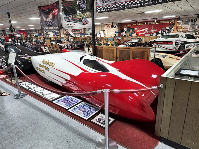 The purple Pandemonium III gleams under museum lights. Its elegant curves belie the raw power that once thundered down drag strips nationwide.