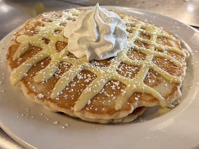 Pancakes drizzled with what appears to be key lime goodness—because in the Keys, even breakfast deserves a tropical vacation.