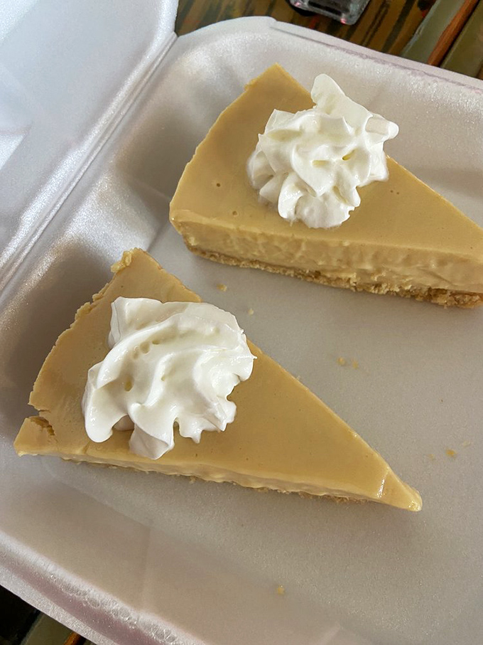 Key lime pie that hits the perfect sweet-tart balance. That dollop of whipped cream isn't just for show—it's the cool counterpoint to citrus sunshine.