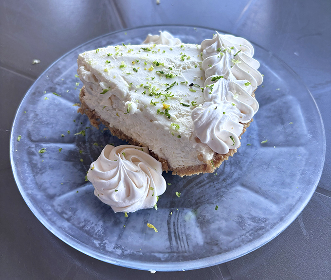 Key lime pie that strikes the perfect balance between sweet and tart—like Florida itself, wrapped in a graham cracker crust and topped with whipped cream dreams.