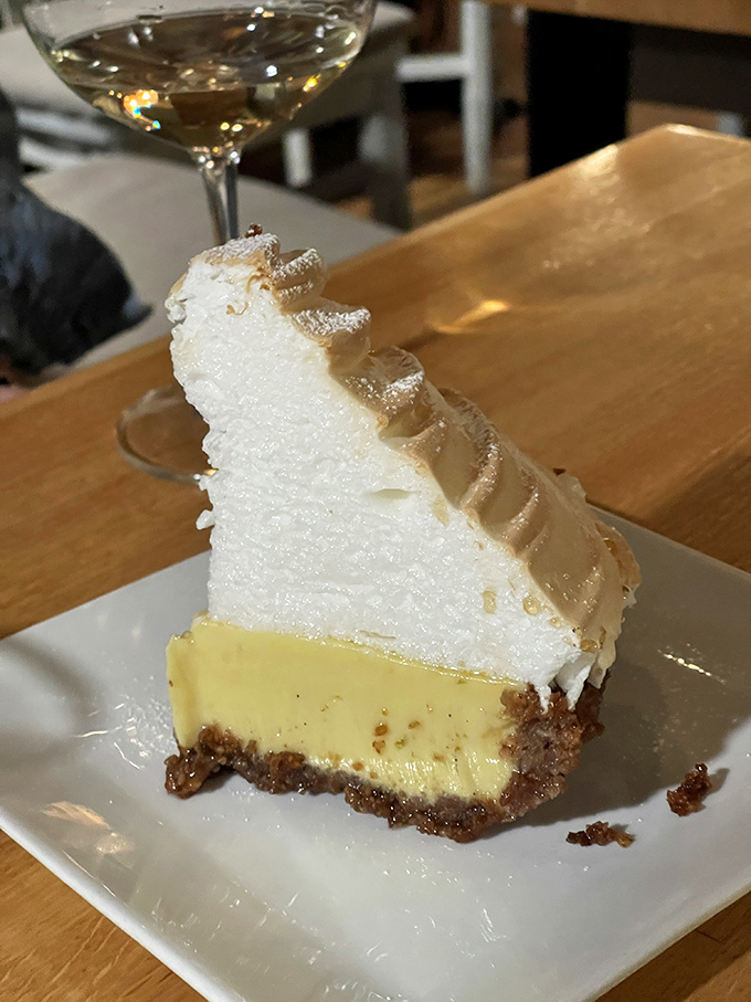 The key lime pie that launched a thousand return visits. That towering meringue is the cloud you'll be floating on after the first bite.