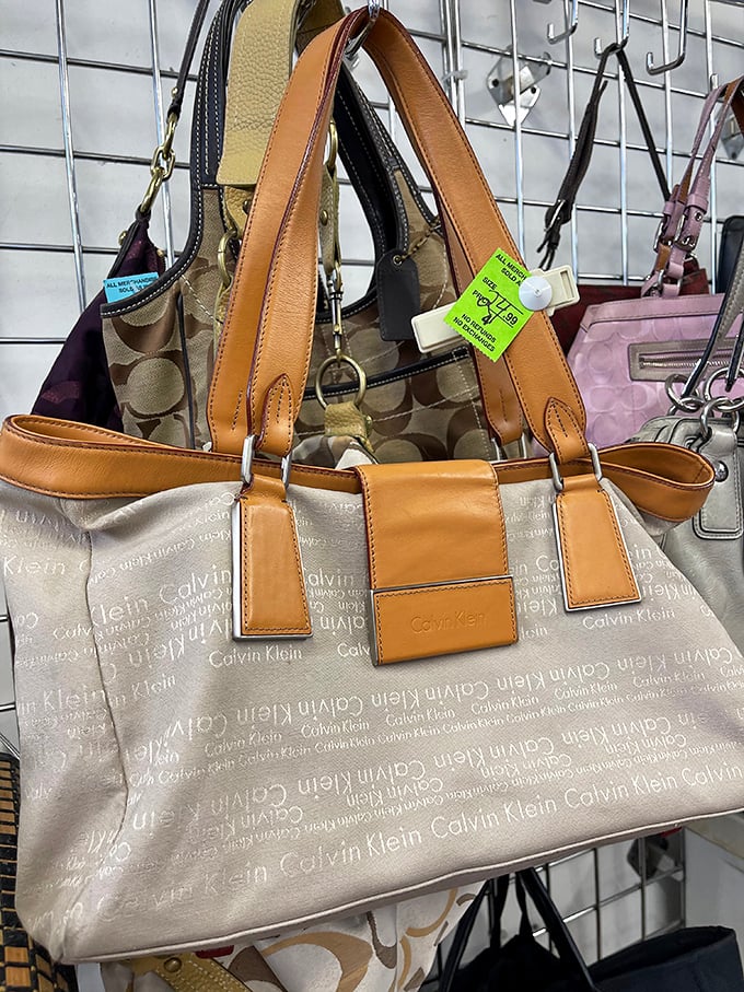 Designer bags at fraction-of-retail prices. That Calvin Klein tote probably cost someone's entire lunch budget back in the day.