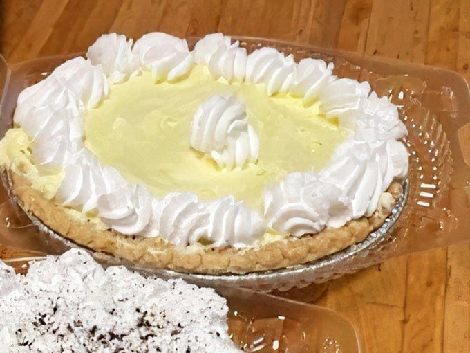 This lemon meringue pie doesn't just whisper sweetness—it announces itself with cloud-like peaks of meringue surrounding a sunshine-yellow center.