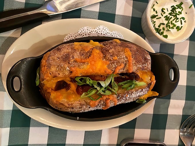 Not your college roommate's potato—this loaded beauty has clearly graduated with honors from the School of Delicious Excess.