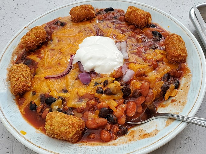Comfort in a bowl—this hearty chili crowned with melted cheese, sour cream, and surrounded by golden tater tots is Pennsylvania's answer to winter.
