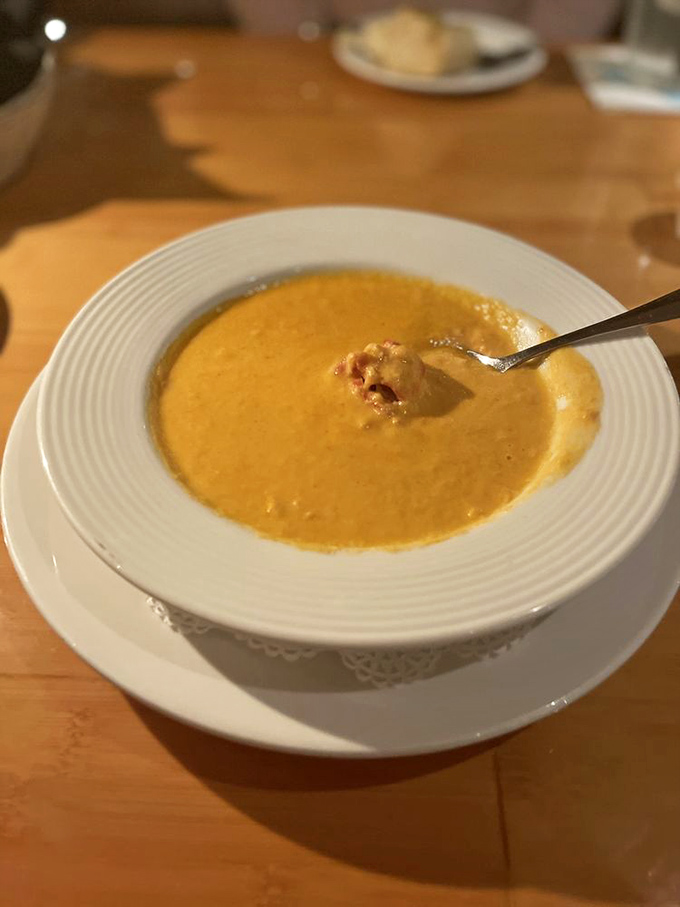 The legendary lobster bisque—liquid gold in a bowl. One spoonful and you'll understand why people drive across counties for this.