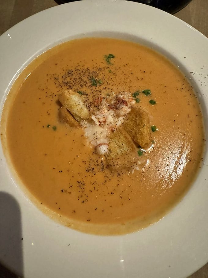 This lobster bisque doesn't whisper its richness—it announces it with a creamy fanfare that makes spoons disappear at record speed.