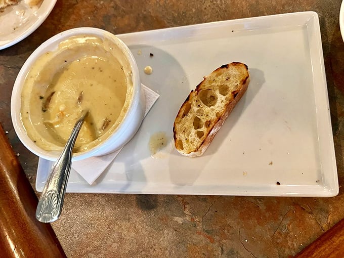 This creamy lobster bisque with a crusty bread accompaniment is comfort food elevated to art form. Warmth and luxury in every spoonful.