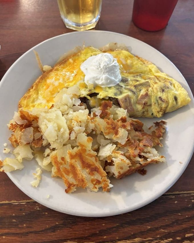 This omelet is the breakfast equivalent of a blockbuster movie—starring eggs, cheese, and a supporting cast of perfectly sautéed vegetables.