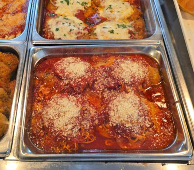 These aren't just meatballs swimming in sauce; they're little spheres of joy that would make any Italian grandmother nod in approval.