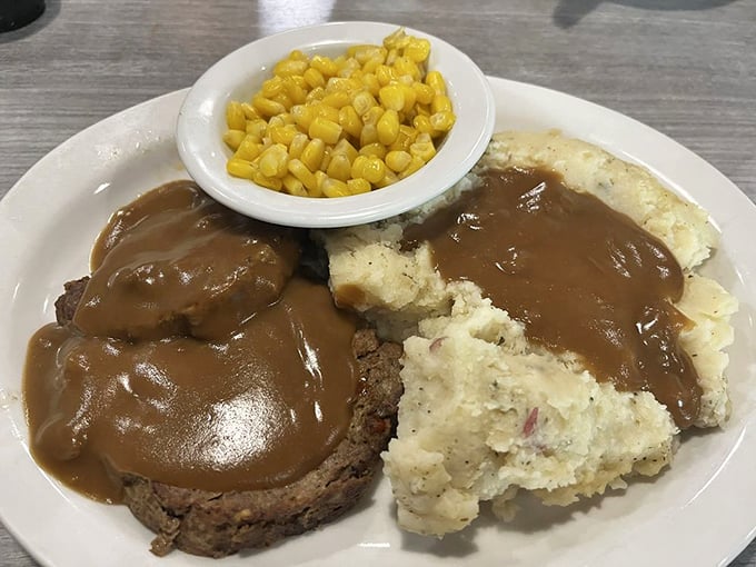 Meatloaf and mashed potatoes with gravy – comfort food so authentic it might accidentally trigger childhood memories you didn't know you had.