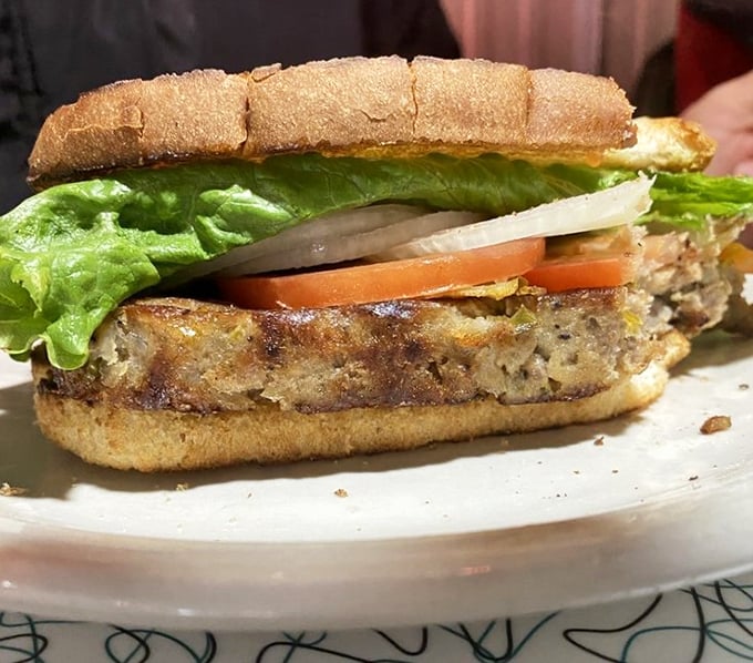 This isn't just a sandwich; it's comfort on carbs. Homestyle meatloaf nestled between toasted bread with fresh veggies for that necessary crunch factor.