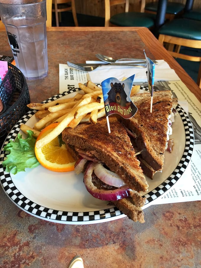 This sandwich arrives with its own bear flag! Perfectly grilled bread, savory fillings, and fries that make you question why you'd ever eat anything else.