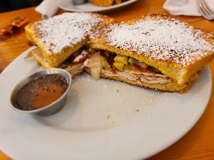 The Monte Cristo – that glorious sandwich that dares to ask, "What if French toast and ham and cheese had a powdered-sugar-dusted baby?"